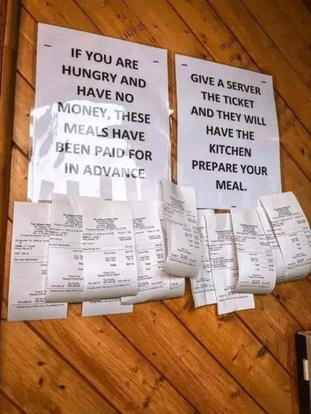 Two people arrive and approached the counter of a little coffee shop ...